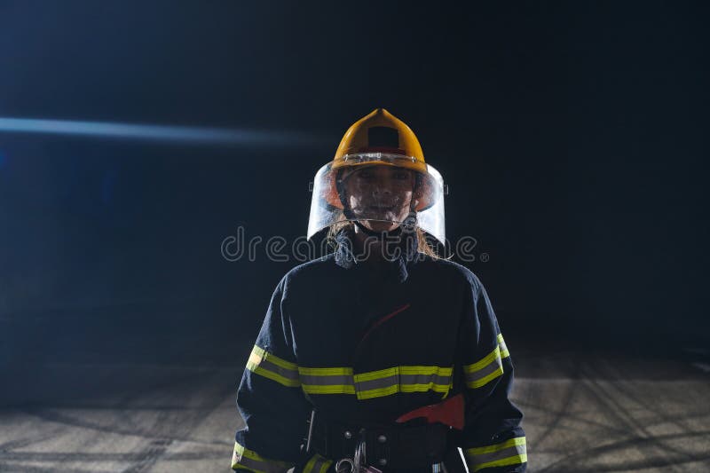 Portrait of a Female Firefighter Standing and Walking Brave and ...
