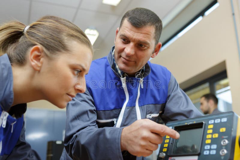 Portrait Female Machine Operator Working with Manager Stock Photo ...