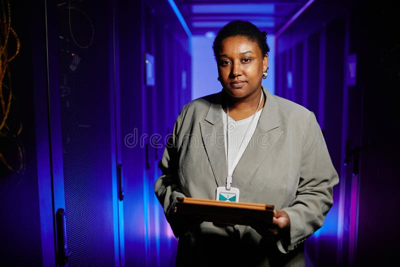 Female Network Engineers Using Laptop in Server Room Stock Photo ...