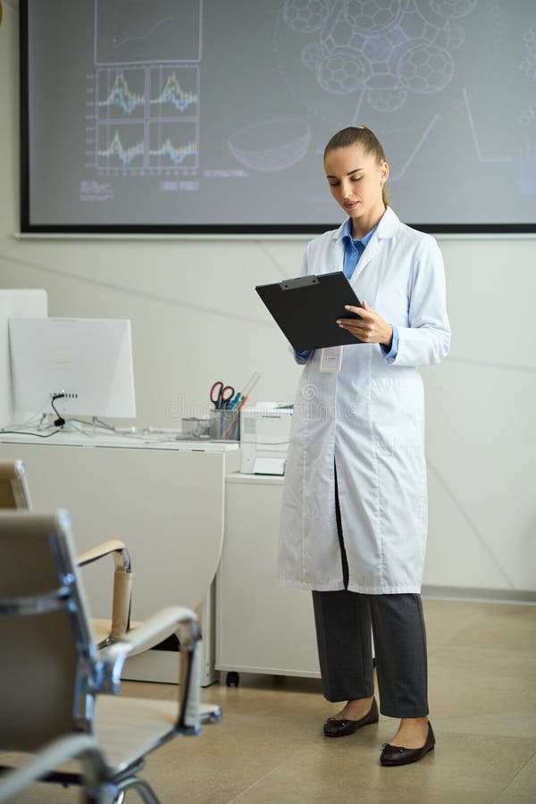 Portrait of Female Scientist Analyzing Data in Laboratory Setting Stock ...
