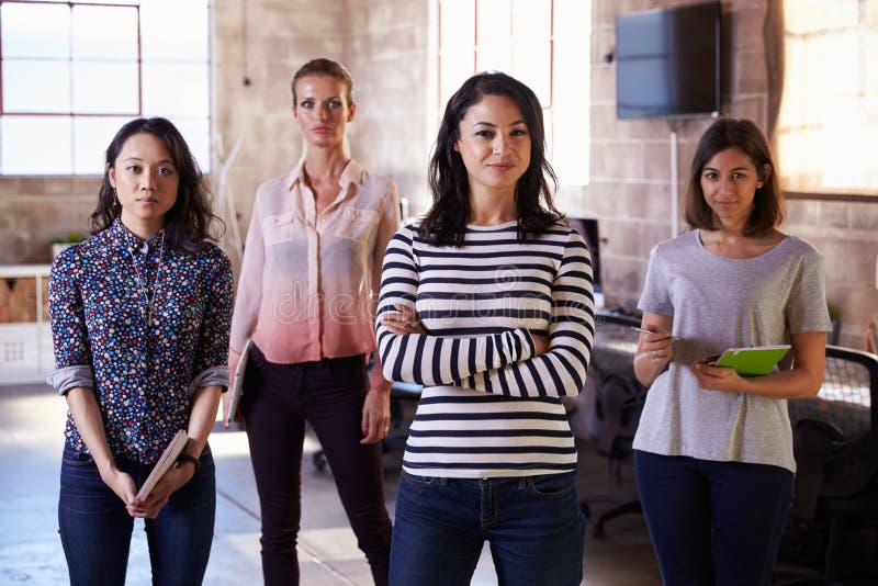 Portrait of Female Staff Standing in Modern Design Office Stock Photo ...