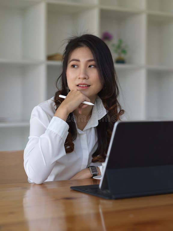 Female Student Thinking about Her Assignment while Working with Tablet ...