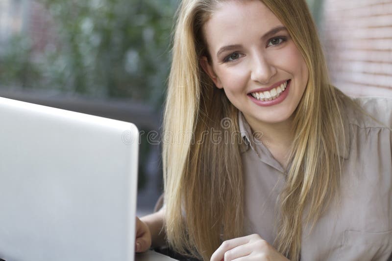 Portrait of a Female Student Using a Laptop Stock Photo - Image of ...