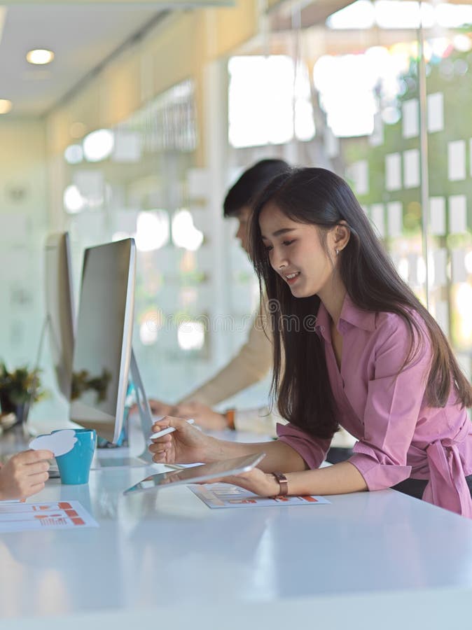 Female App Developer is in the Meeting with Her Team, Brainstorming and ...
