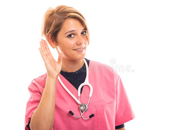 Portrait Of Female Vet Wearing Pink Scrub Showing Can`t Hear Ges Stock