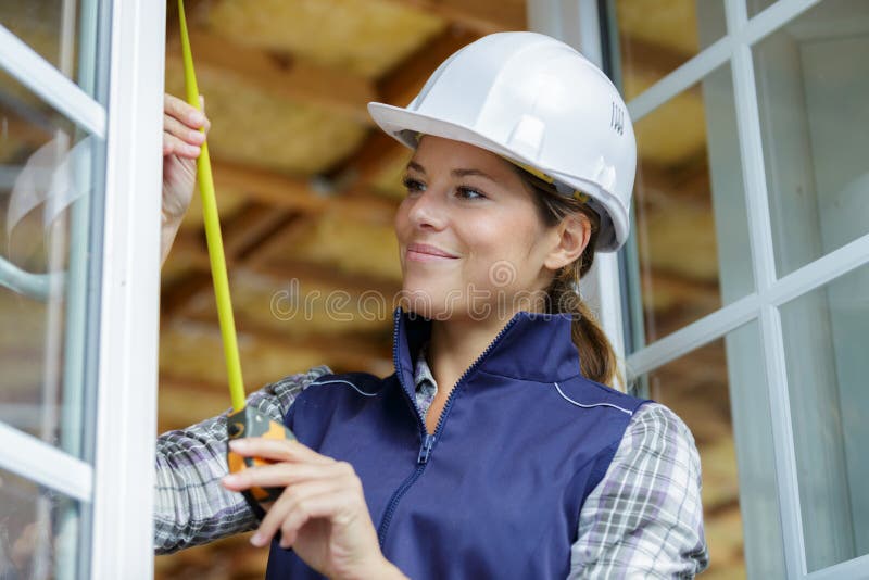 Portrait Female Worker Measuring Window Stock Image - Image of manual ...