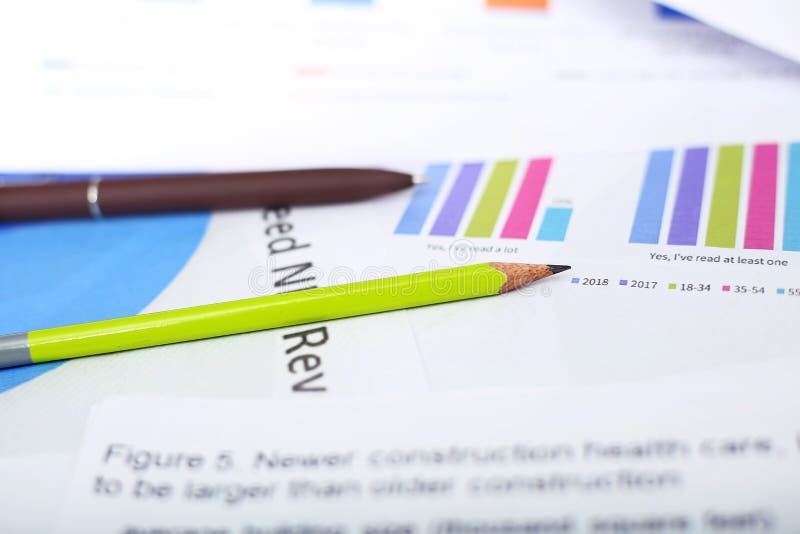 Portrait of Bar Graph on Paper and Tablet with Pen and Pencil Stock ...