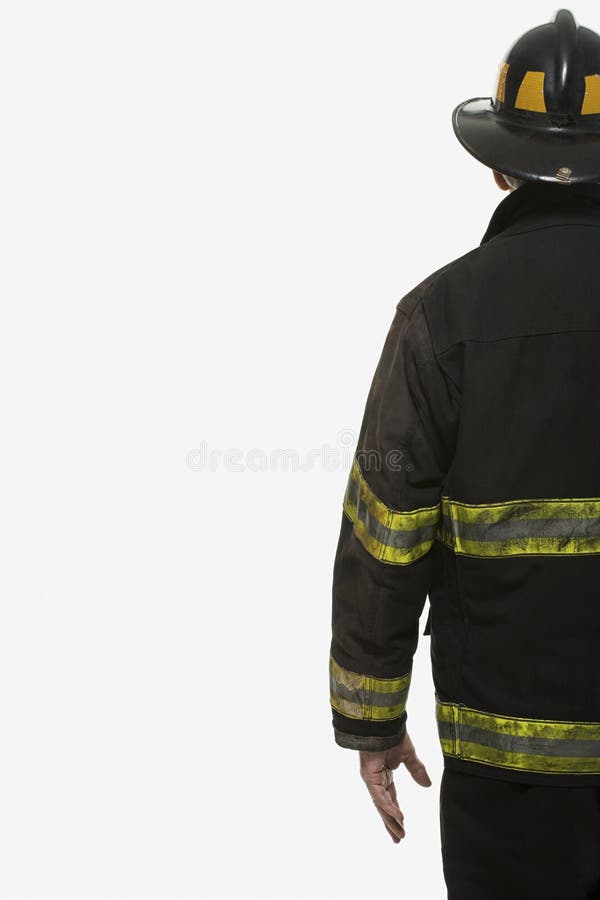 Portrait of a Firefighter Standing in Front of a Fire Engine. Fireman ...