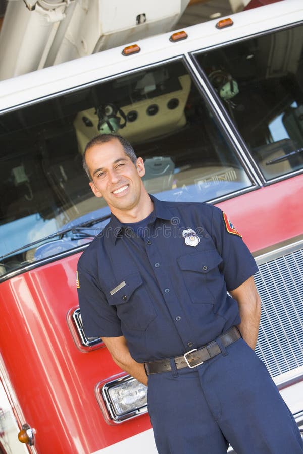 Portrait of a Firefighter by a Fire Engine Stock Photo - Image of ...