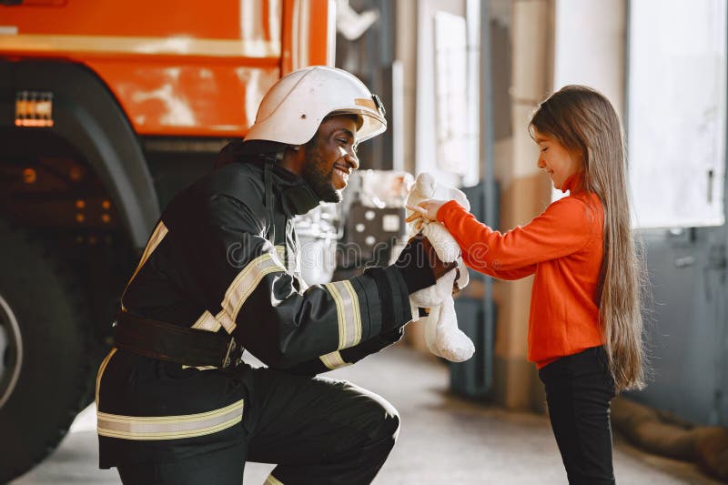 Portrait of a Firefighter Standing in Front of a Fire Engine Stock ...