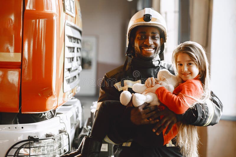 Portrait of a Firefighter Standing in Front of a Fire Engine Stock ...