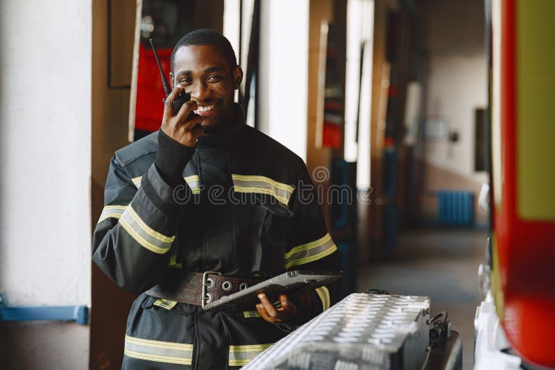 Portrait of a Firefighter Standing in Front of a Fire Engine Stock ...