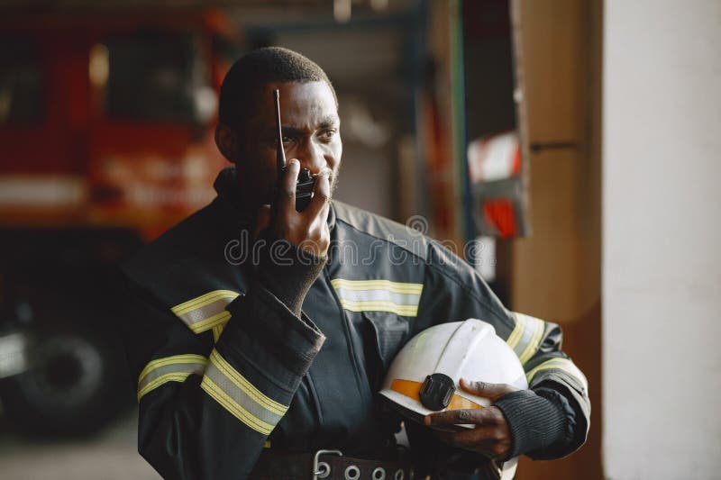 Portrait of a Firefighter Standing in Front of a Fire Engine Stock ...