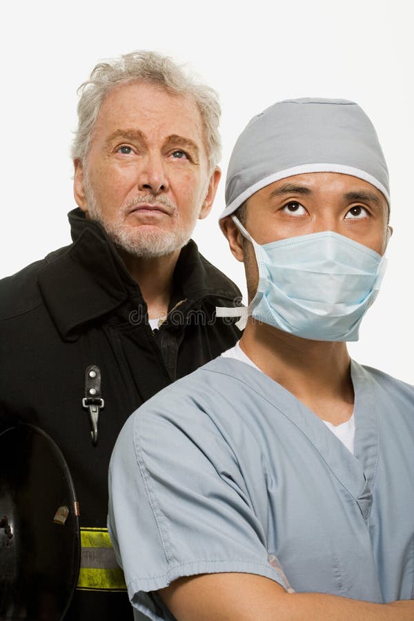 Portrait of a Firefighter and a Surgeon Stock Image - Image of ...