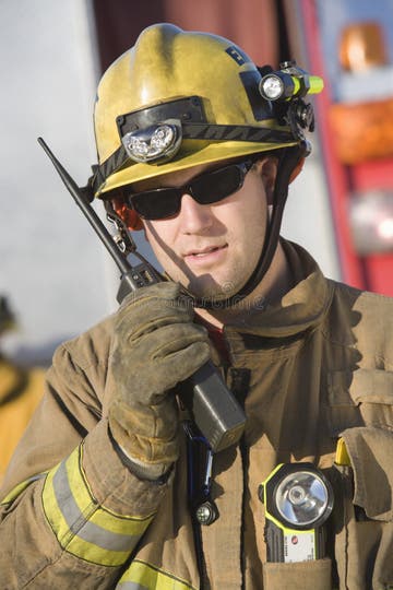 Portrait of a Firefighter Talking on Radio Stock Image - Image of ...