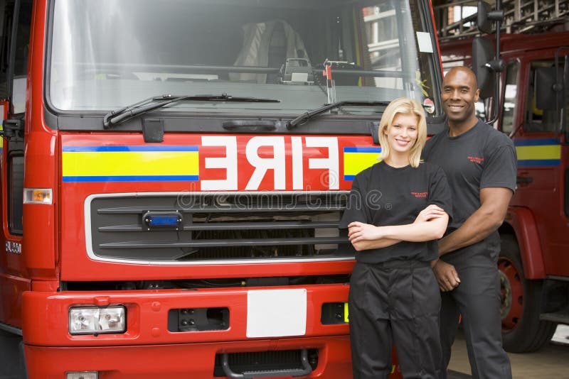 Portrait of Two Firefighters by a Fire Engine Stock Photo - Image of ...