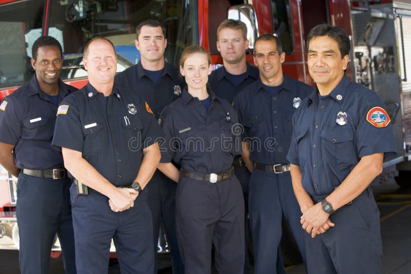 Portrait of Firefighters Standing by a Fire Engine Stock Photo - Image ...