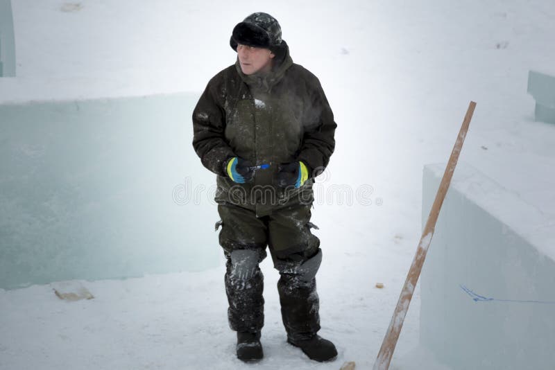 A Portrait of a Fitter Next To an Ice Block Stock Photo - Image of doll ...
