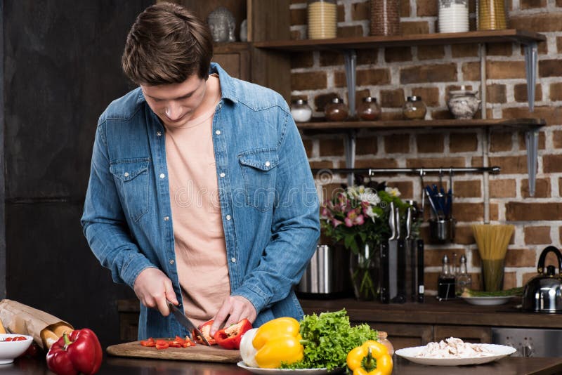 Portrait of Focused Man Cooking Dinner Alone Stock Photo - Image of ...
