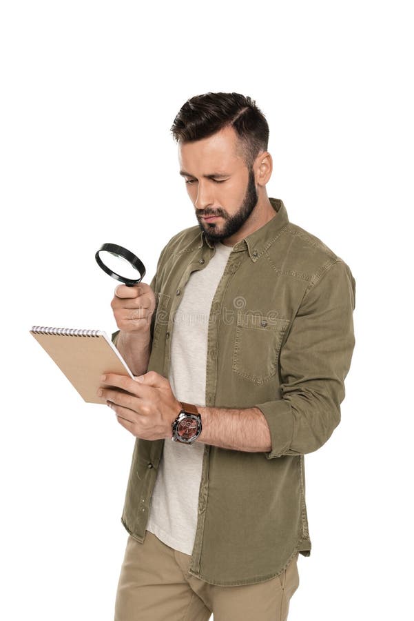 Portrait of Focused Man Looking at Notebook through Magnifying Glass ...