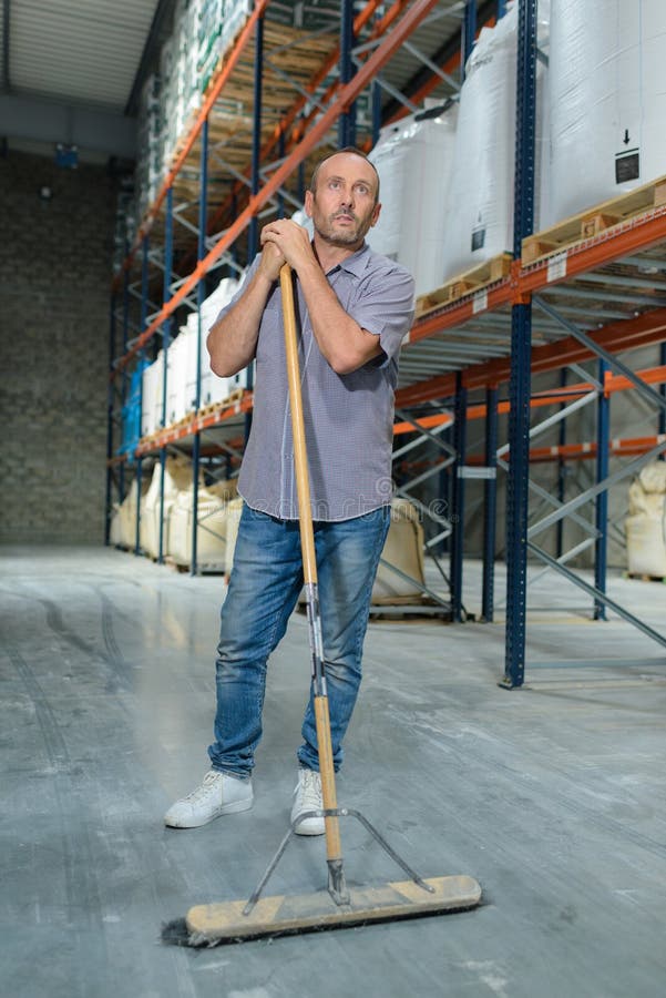 Portrait Focused Man Moping Warehouse Floor Stock Photo - Image of ...