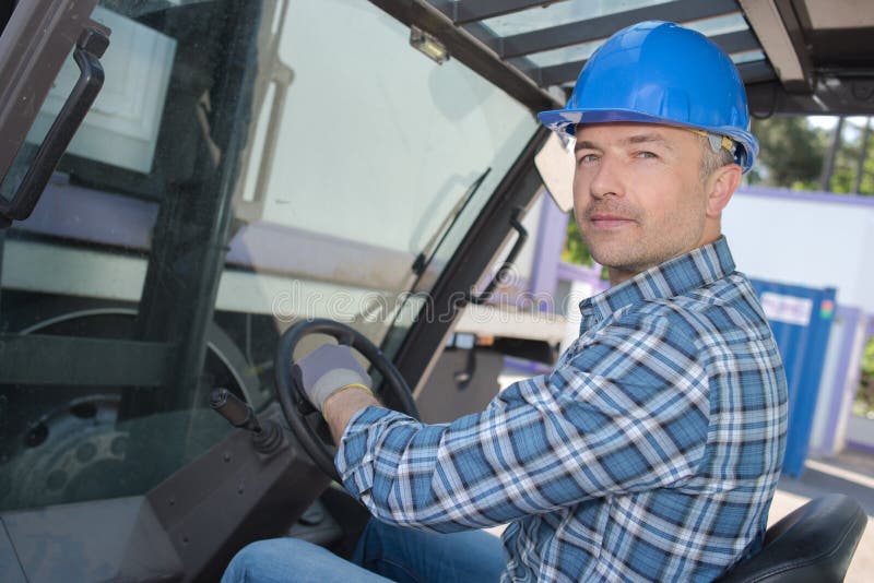 Portrait forklift driver stock image. Image of move - 258969207