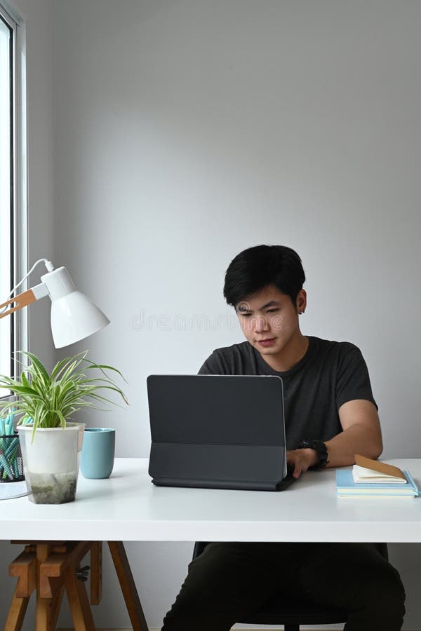 Portrait of a Freelance Graphic Designer Man is Working on Computer ...