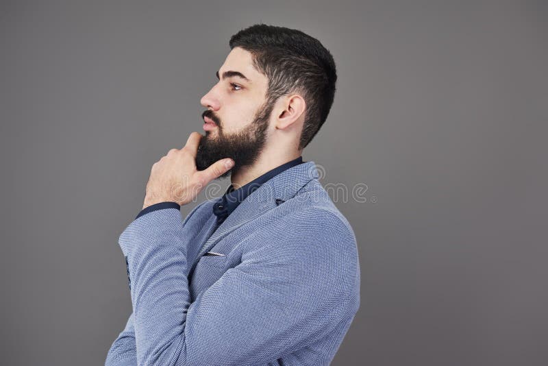 Portrait of Freelancer Man with Beard in Jacket Standing Against Gray ...