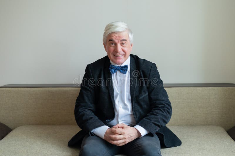 Portrait of a Friendly Elderly Business Man Stock Photo - Image of ...