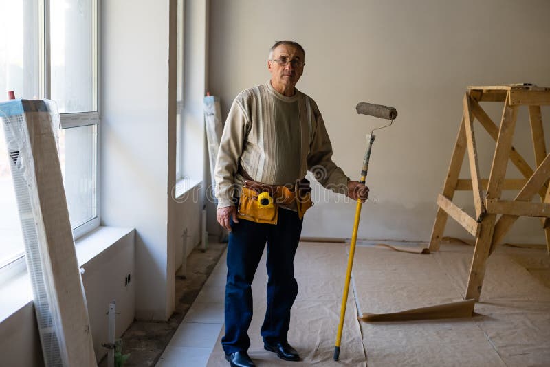Portrait of a Friendly Painter at Work in an Apartment Stock Photo ...