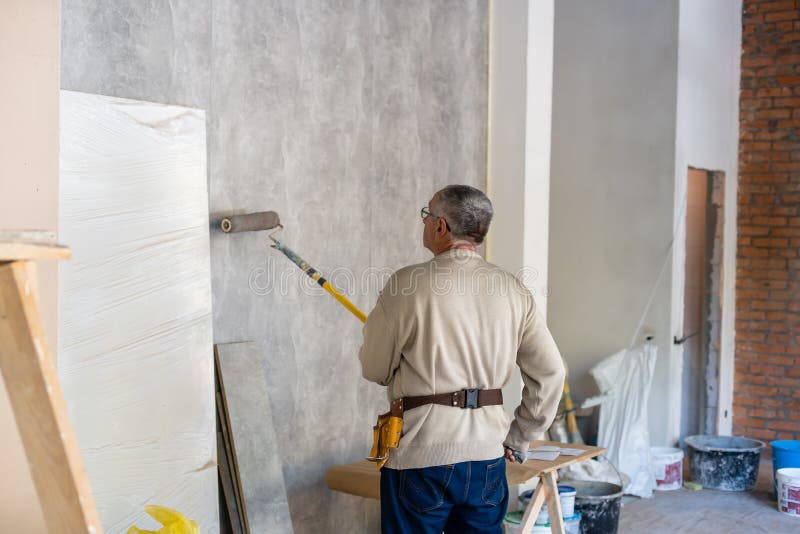 Portrait of a Friendly Painter at Work in an Apartment Stock Photo ...