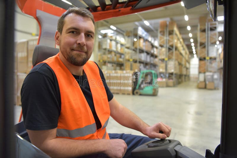 Portrait of Friendly Warehouse Worker in a Forwarding Agency - Interior ...