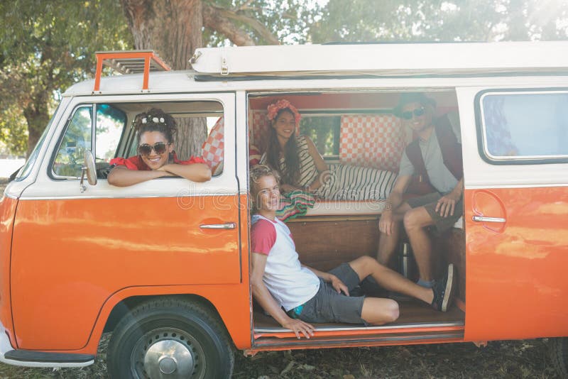 Portrait of Friends Sitting in Camper Van Stock Image - Image of adult ...