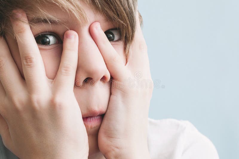 Portrait of frightened boy stock image. Image of negative - 131414867