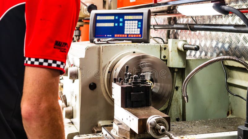 Portrait of a Full Force Racing Component Operating a Lathe Editorial ... Portrait of a Full Force Racing Component Operating a Lathe Editorial ...