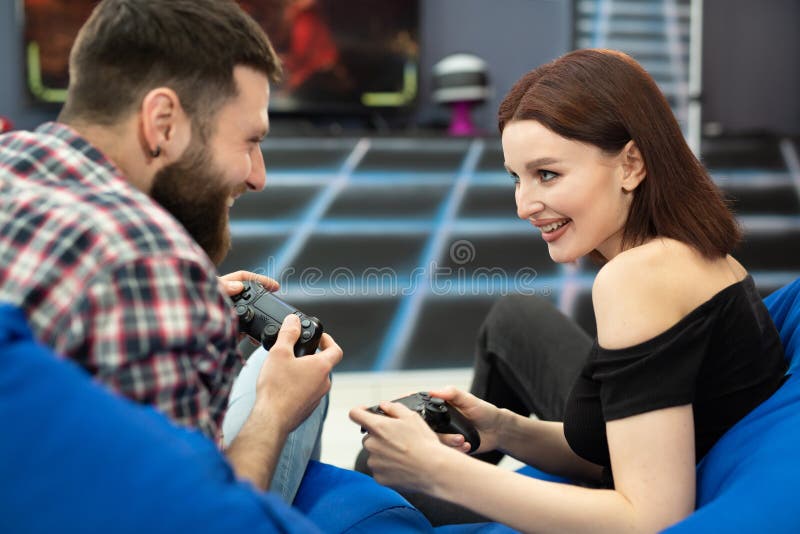 Portrait of a Active Couple Who Compete in a Video Game Game with a ...