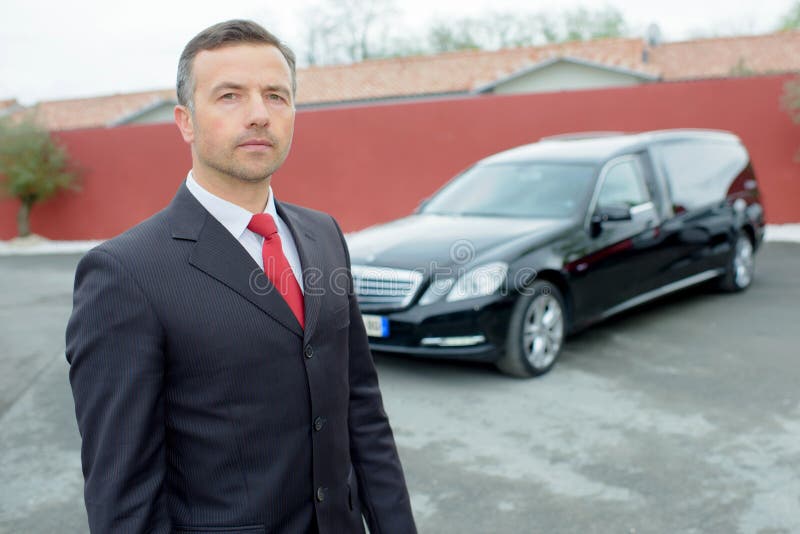 Portrait Funeral Director in Front Hearse Stock Image - Image of ...