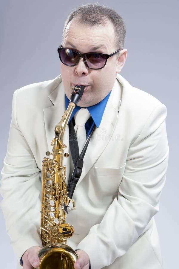 Portrait of Funny Caucasian Saxophone Player in Sunglasses Stock Photo ...