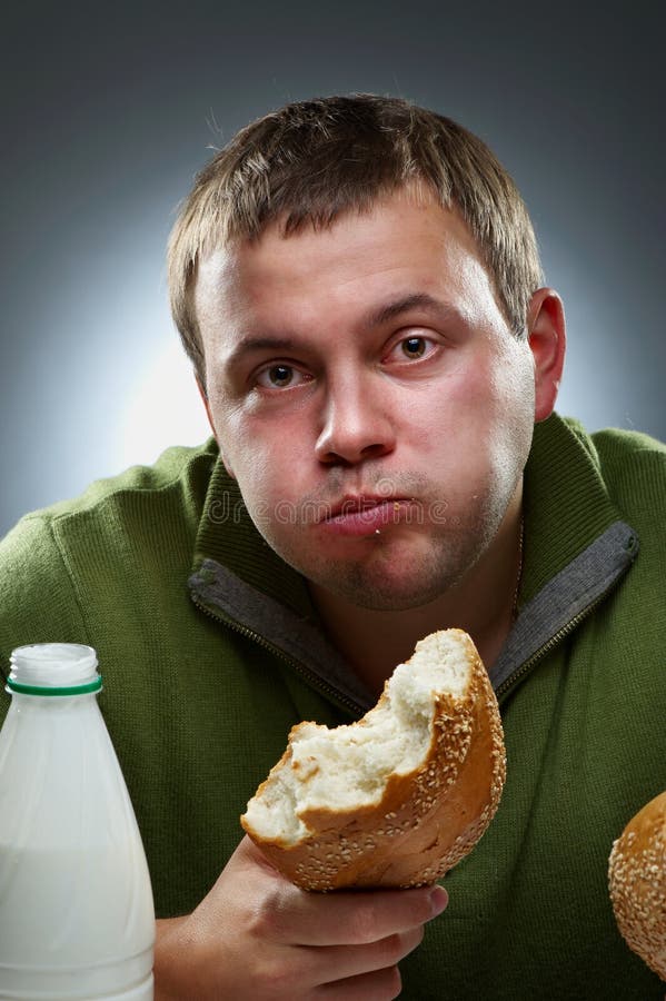 Hungry Corpulent Man Eating White Bread Stock Photo - Image of dinner ...