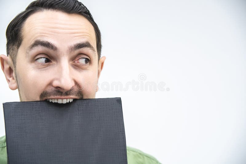 Portrait Of Funny Mid Adult Caucasian Businessman Grimacing And Mocking