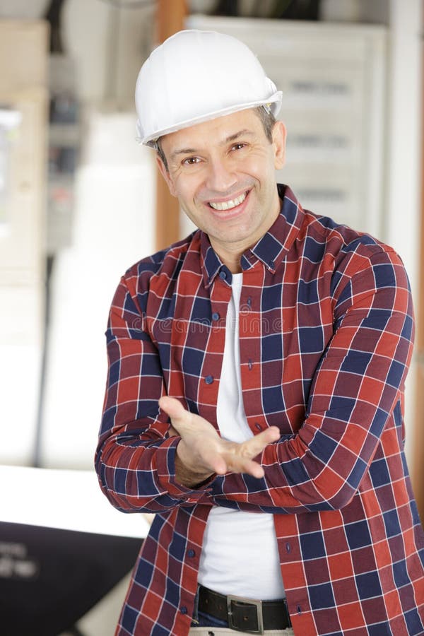 Portrait Gesticulating Tradesman Wearing Hardhat Stock Image - Image of ...