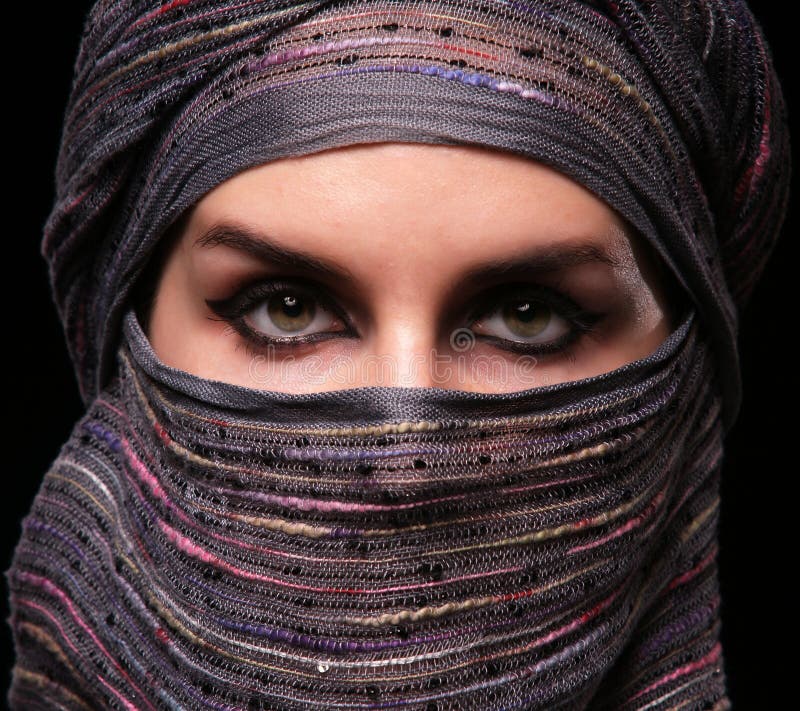 Beautiful Arab Woman in a Red Headdress. Portrait of an Arab Woman ...