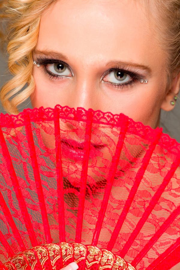 Portrait of Girl Closing Face with Textile Fan Stock Photo - Image of ...