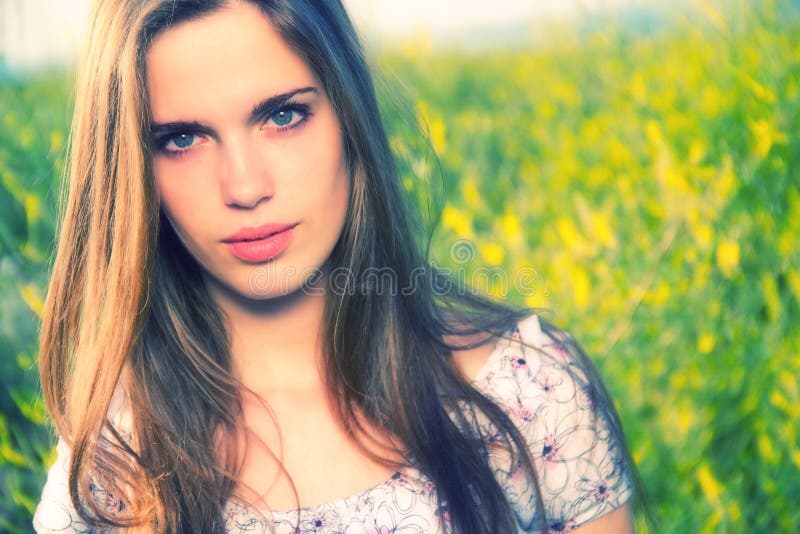 Portrait of girl in meadow stock image. Image of grass - 25661413