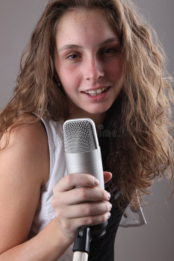 Portrait of a Girl with a Microphone Stock Image - Image of audio ...