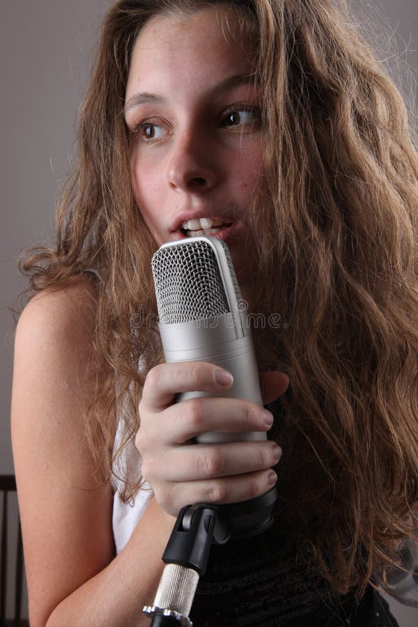 Portrait of a Girl with a Microphone Stock Image - Image of audio ...