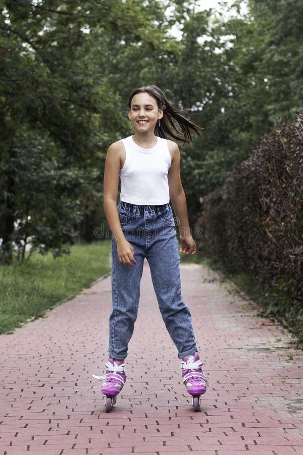 Portrait of a Girl Rollerblading in Park Stock Image - Image of action ...