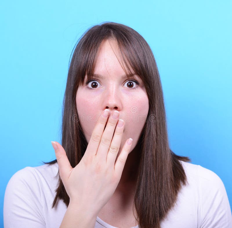 Portrait of Girl with Shock Gesture Against Blue Background Stock Image ...