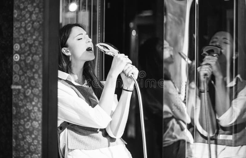 Girl singing in the shower stock photo. Image of looking - 196825146