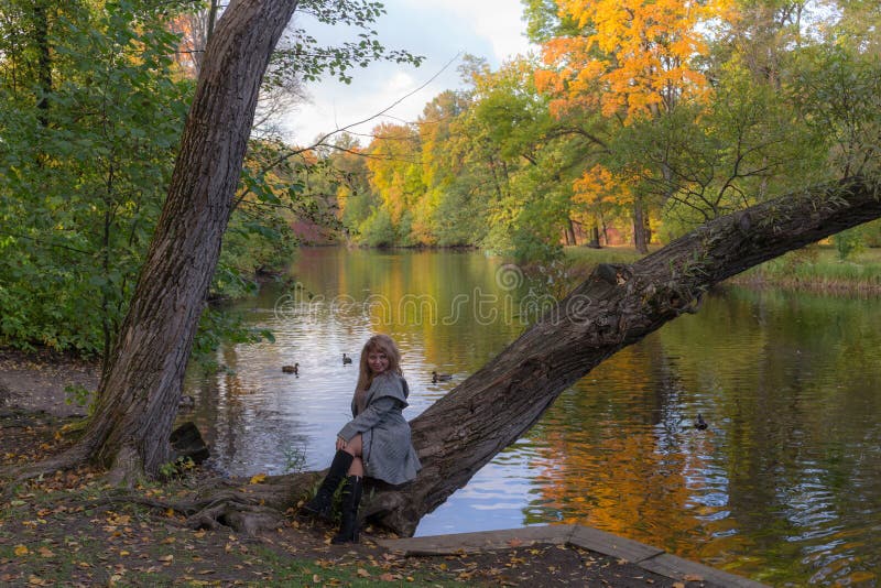 Portrait of a Girl on a Tree by the Water Stock Image - Image of model ...